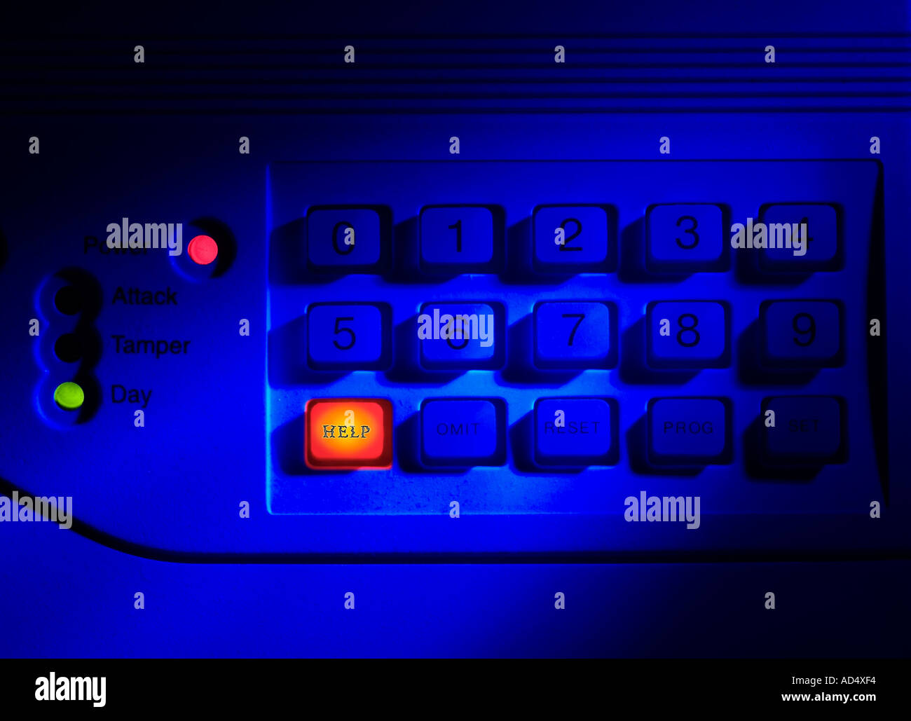 Burglar alarm control panel keypad with help button illuminated Stock ...