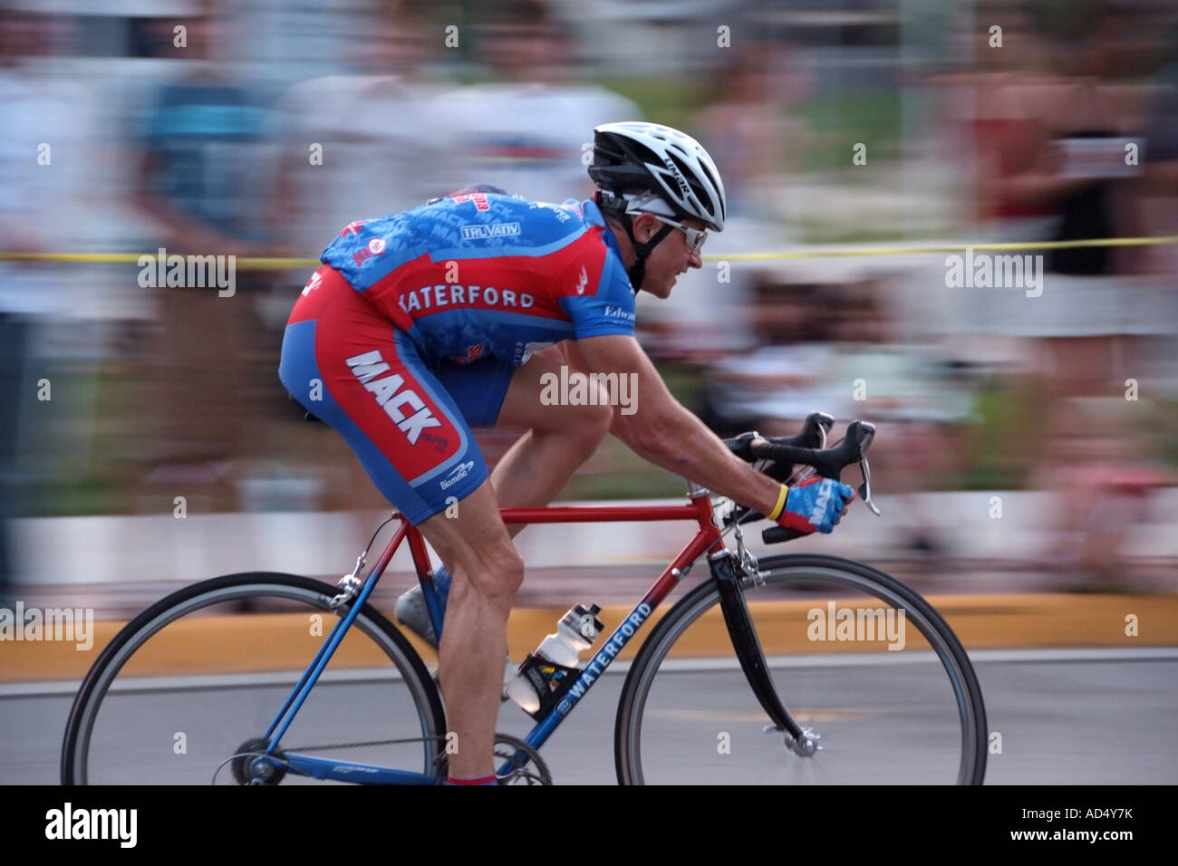 A young man riding on racing bicycle Stock Photo - Alamy