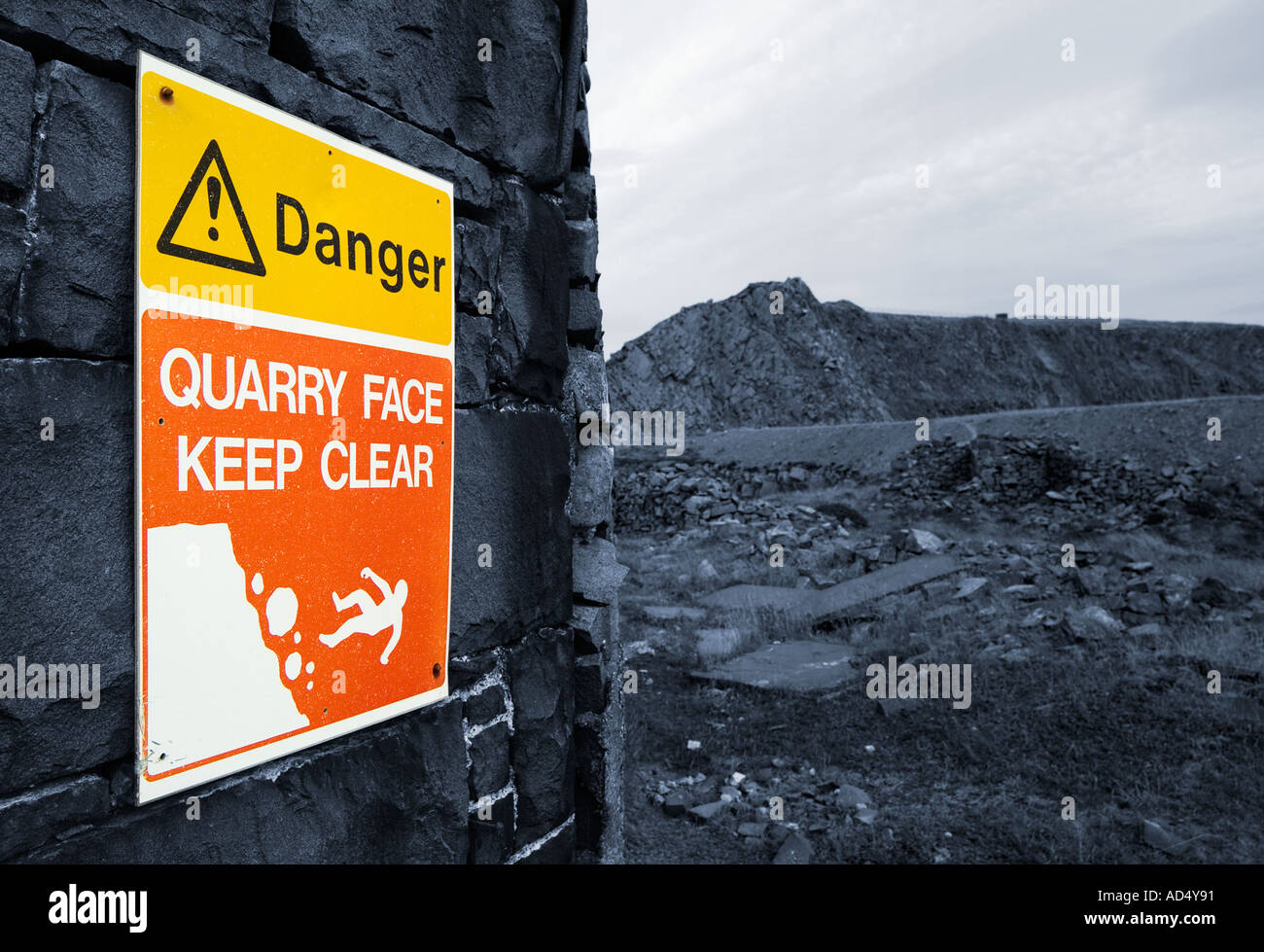Warning sign in a quarry Stock Photo - Alamy