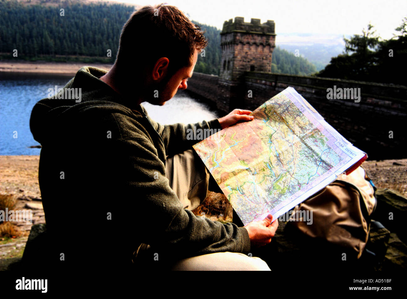 Man reading map Stock Photo - Alamy