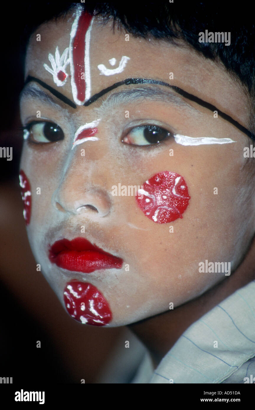 Young boy wears facial paint for theatrical performance during Indra ...