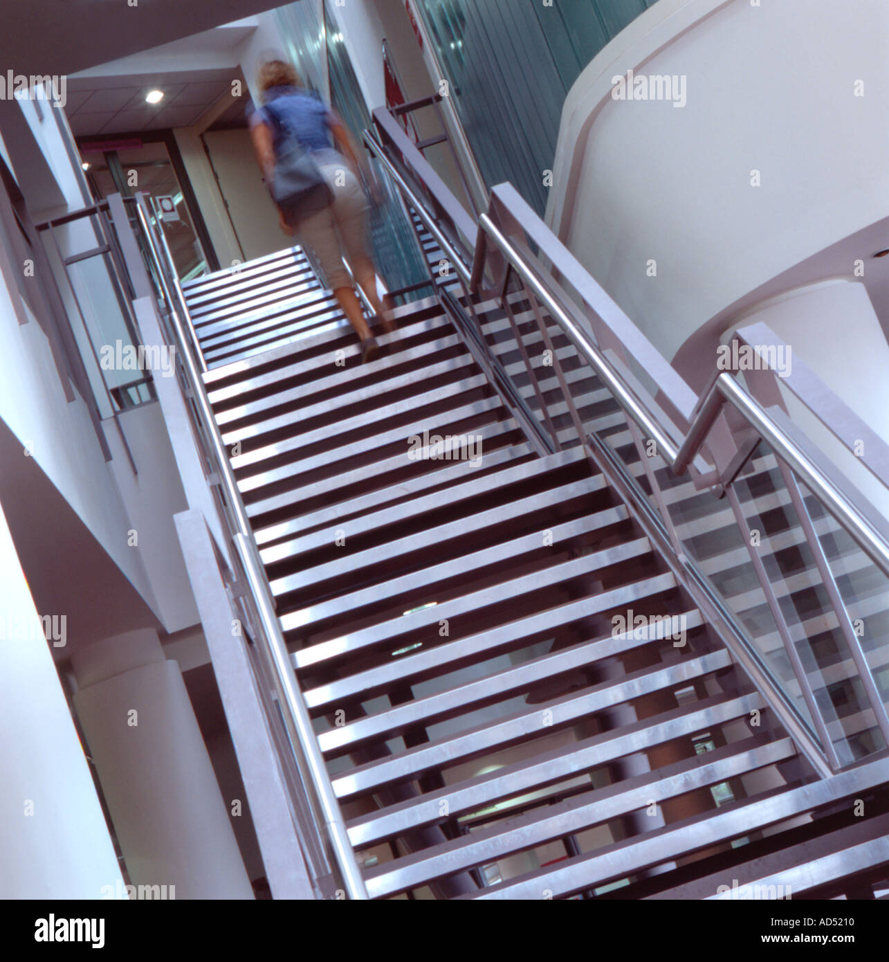 person walking up stairs Stock Photo - Alamy