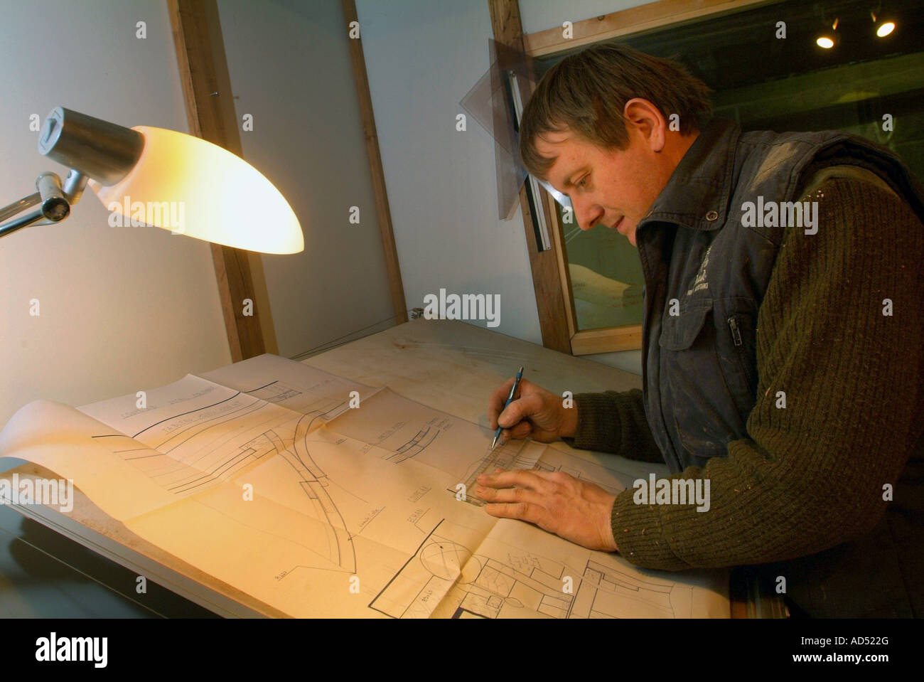 Man sketching a plan Stock Photo - Alamy
