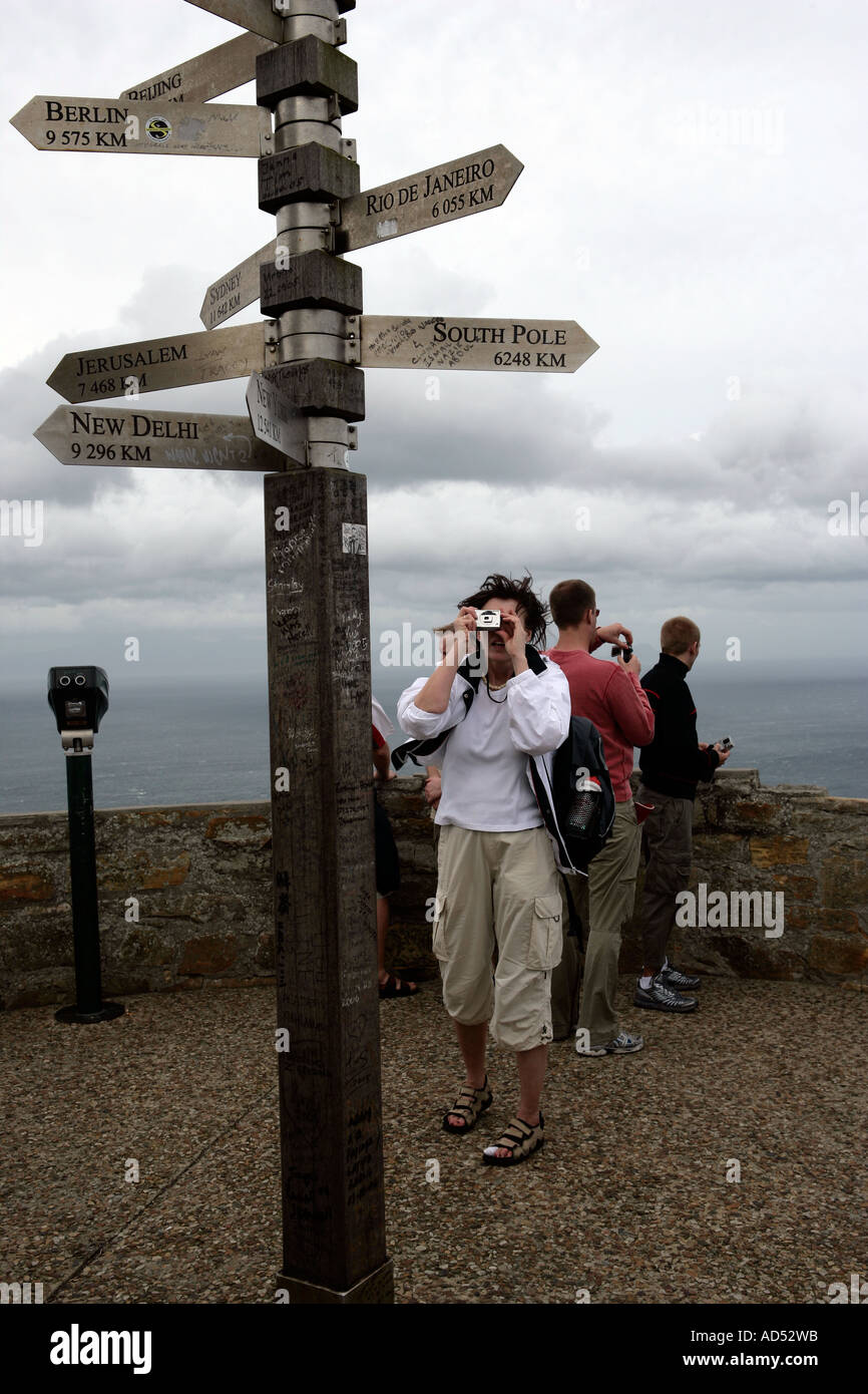 Tourists at Cape Point near Cape Town, South Africa, taking photos of ...