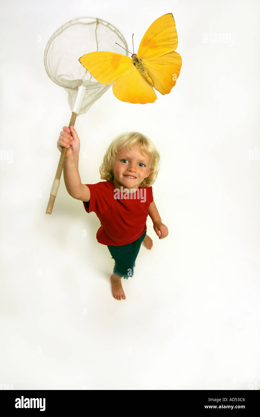girl catching butterfly Stock Photo - Alamy