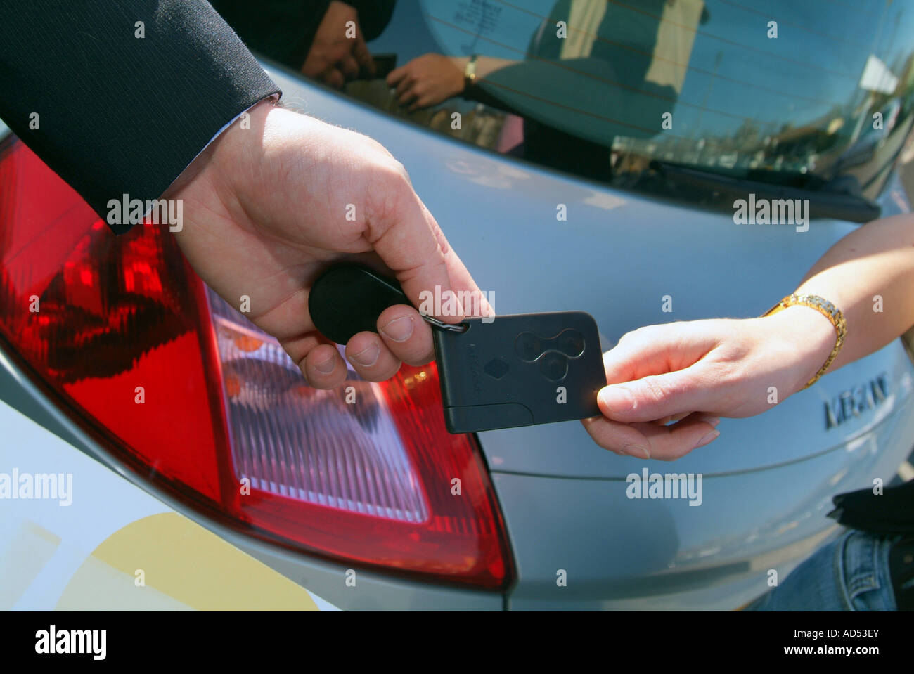 Salesman and client Stock Photo - Alamy