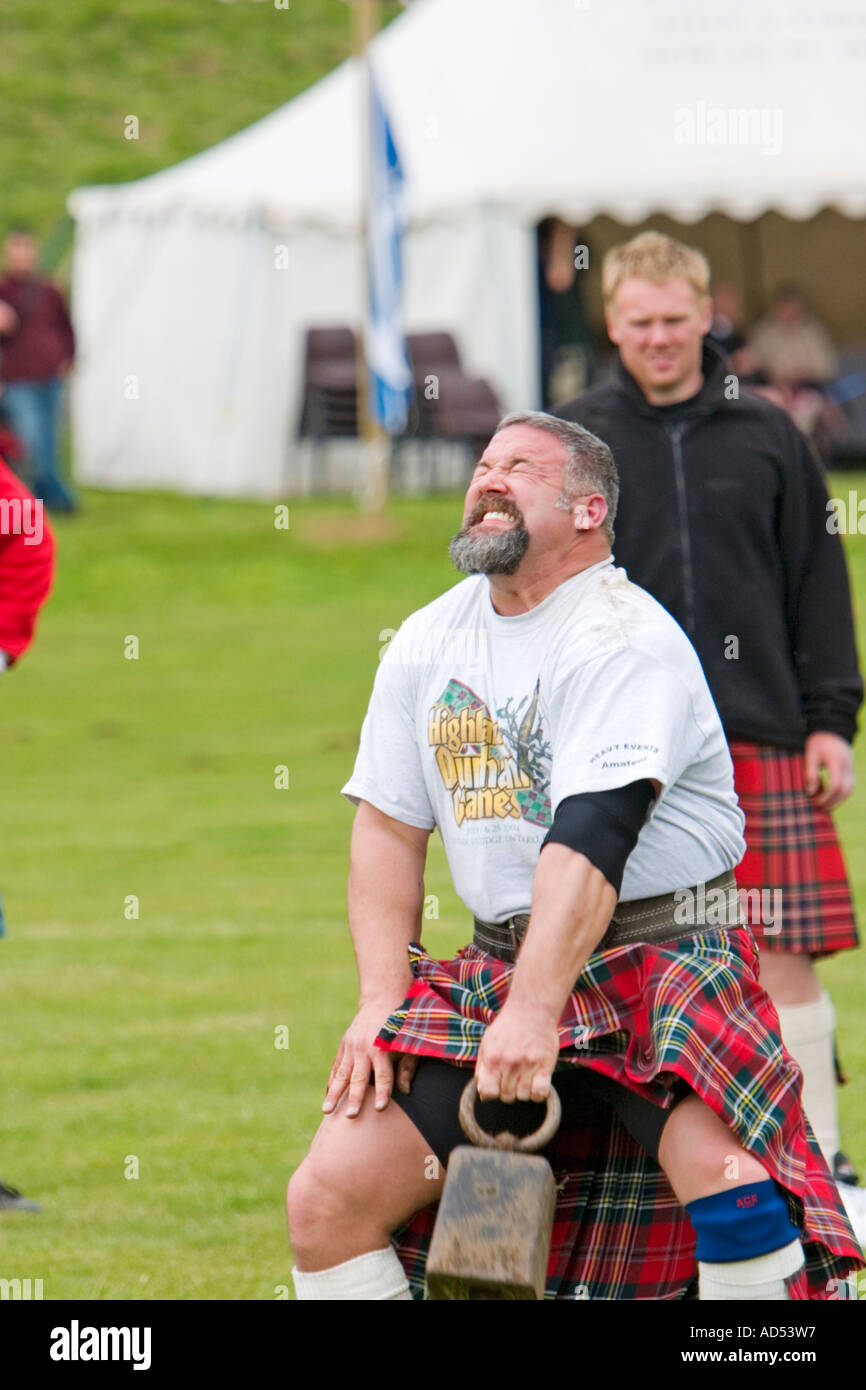 Throwing heavy weight over high bar at 2006 Atholl Gathering Highland ...
