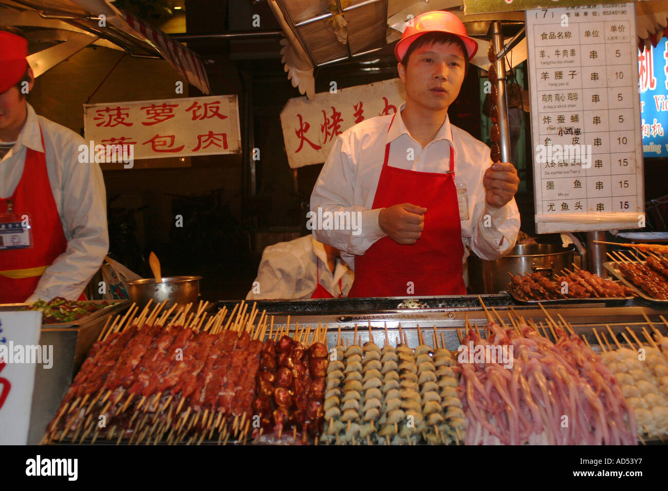 Selling snakes and other delicacies at Beijing's night food market off ...