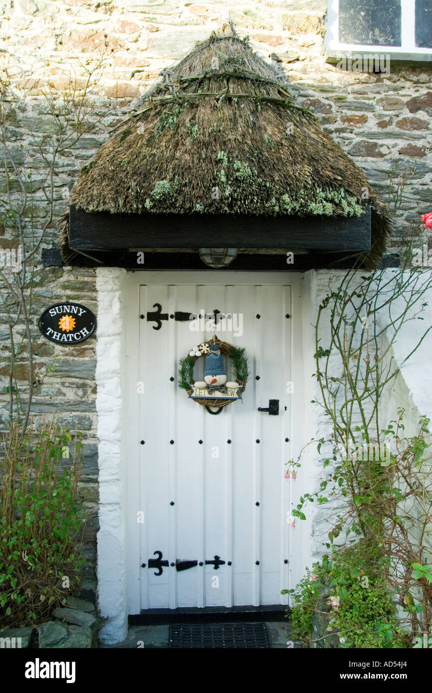 Country cottage door with thatched porch sunny thatch Stock Photo - Alamy