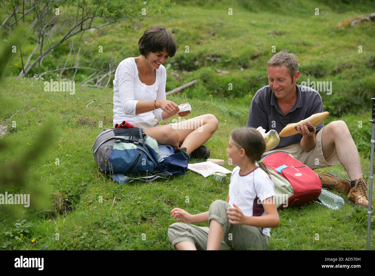 Family having a picnic in the countryside Stock Photo - Alamy