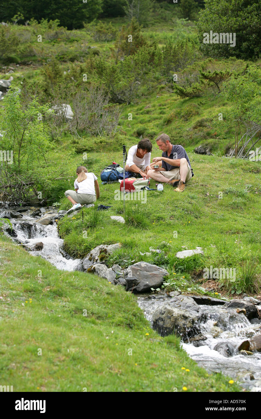 Family having a picnic in the countryside Stock Photo - Alamy