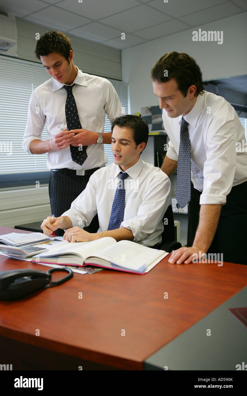 Professionals at the office Stock Photo - Alamy
