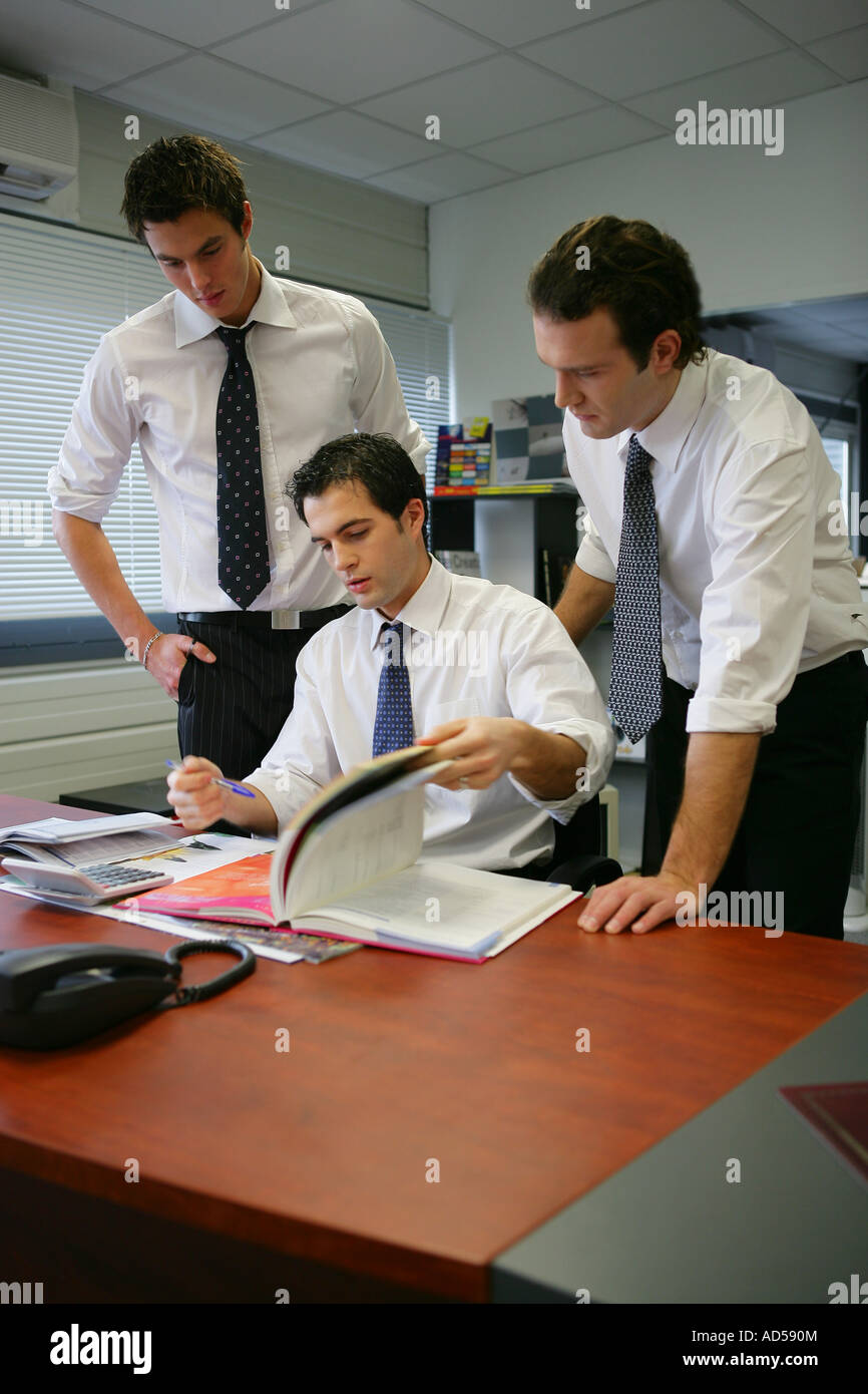 Professionals at the office Stock Photo - Alamy