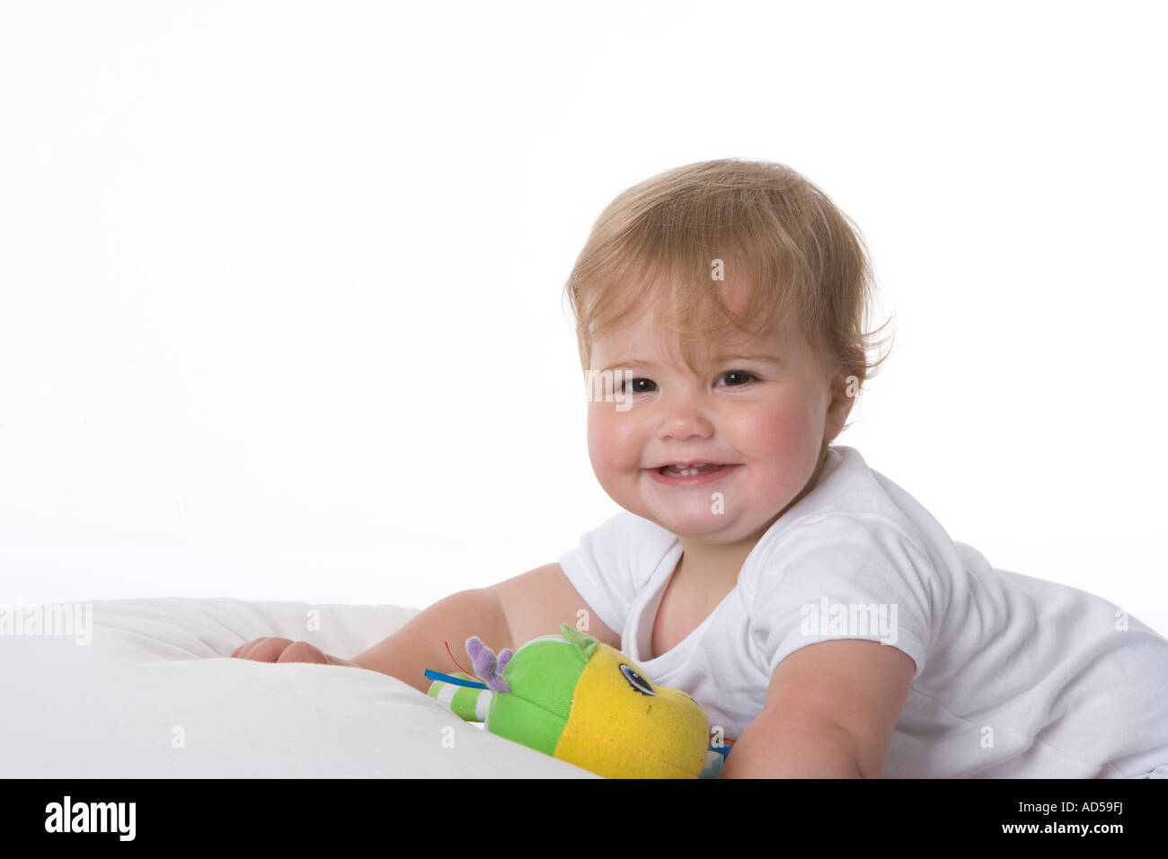 Portrait of a happy active baby girl Stock Photo - Alamy