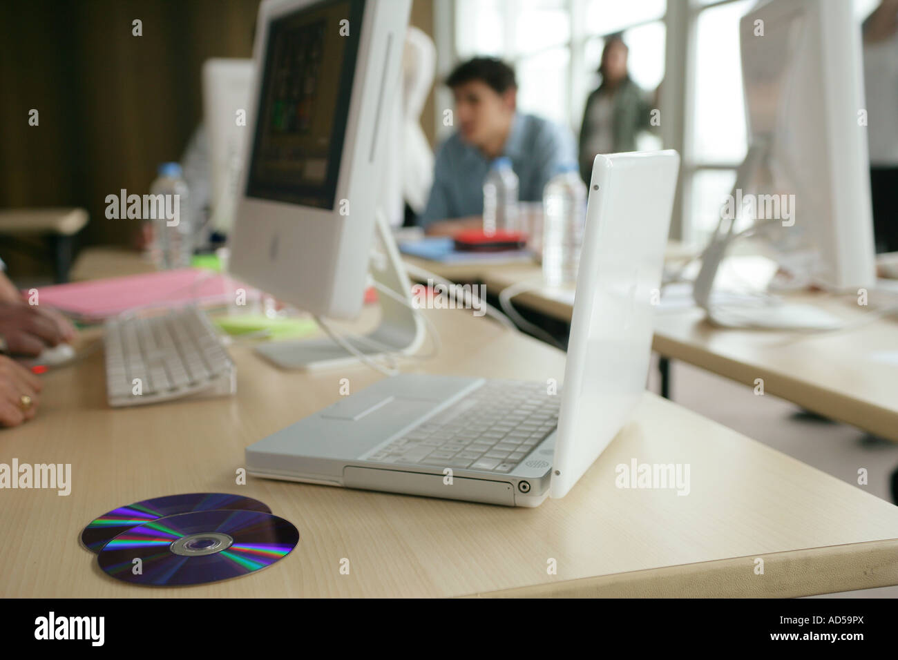 Young professionals using computers Stock Photo - Alamy