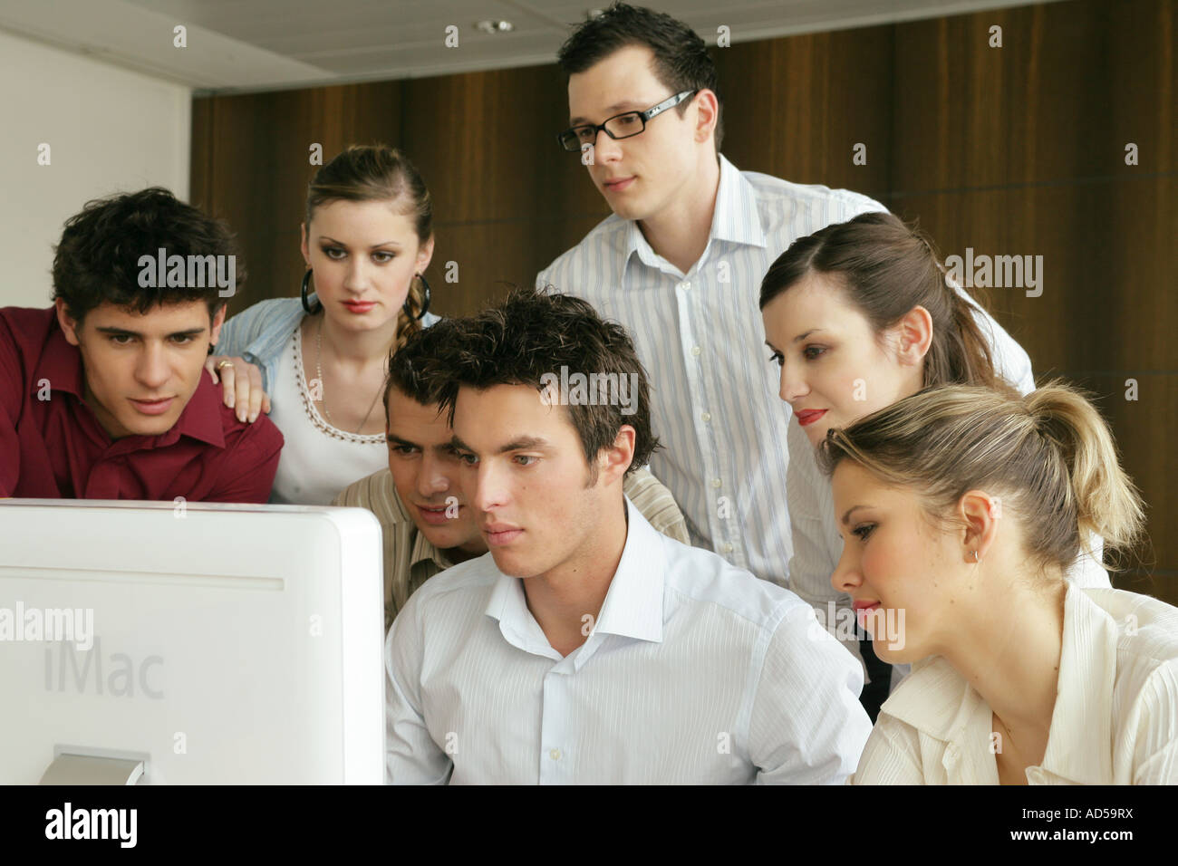Young professionals using computers Stock Photo - Alamy