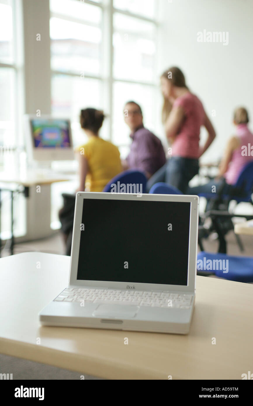 Young professionals using computers Stock Photo - Alamy