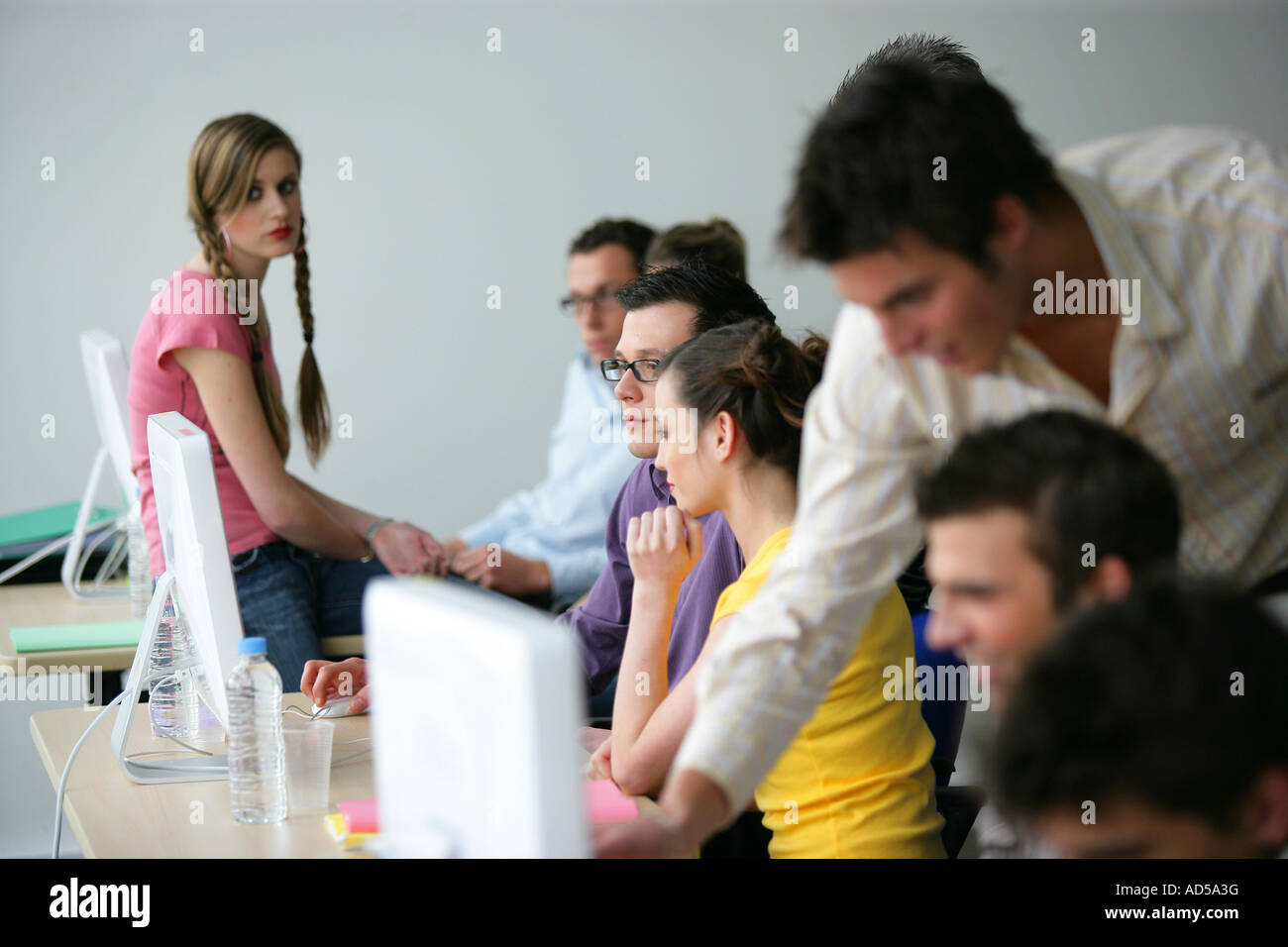 Young professionals using computers Stock Photo - Alamy
