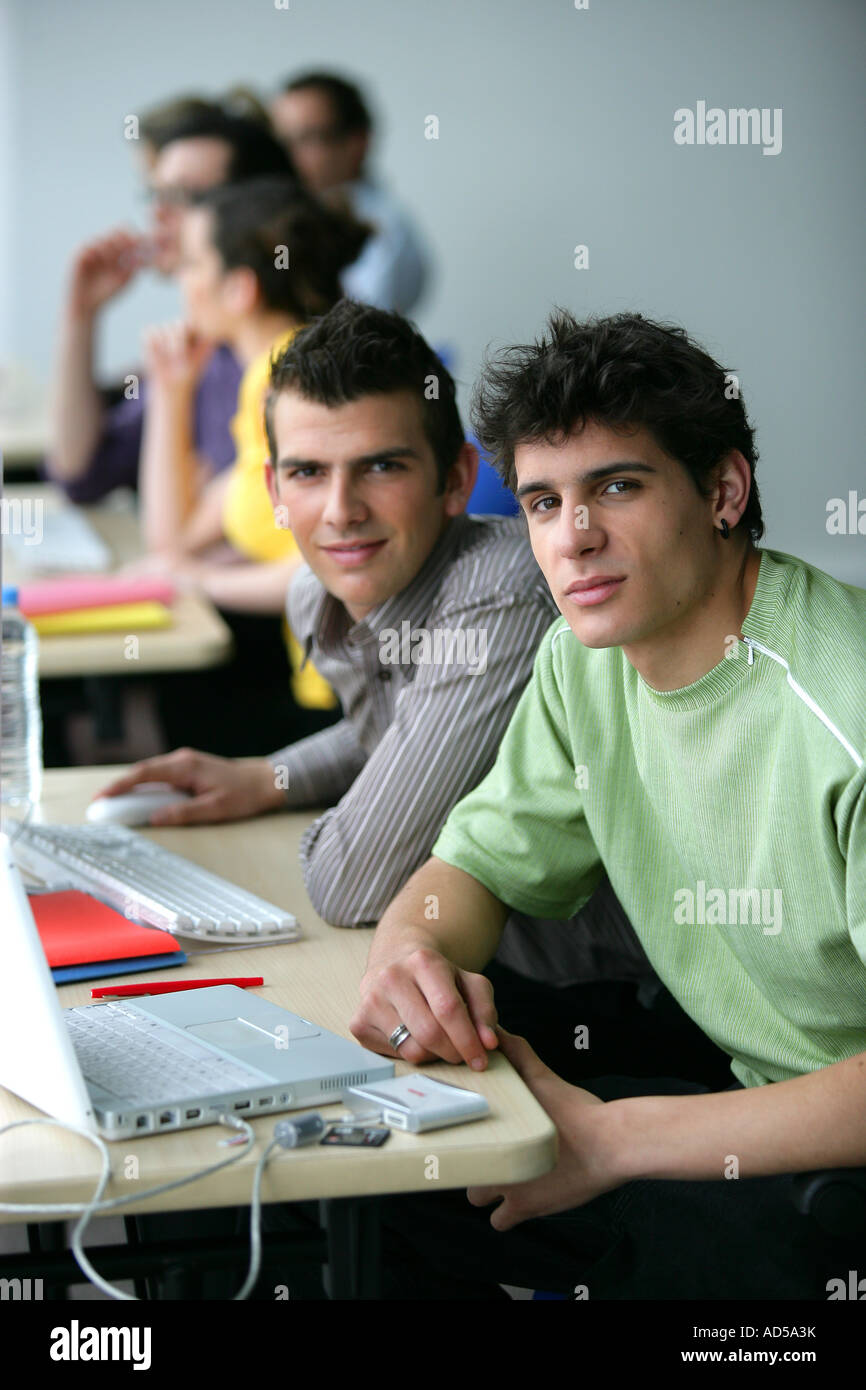 Young professionals using computers Stock Photo - Alamy