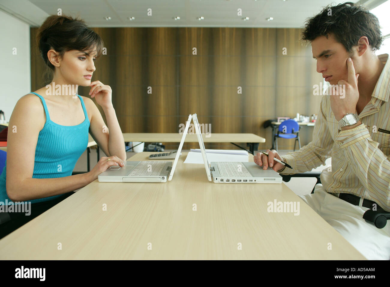 Young professionals using computers Stock Photo - Alamy