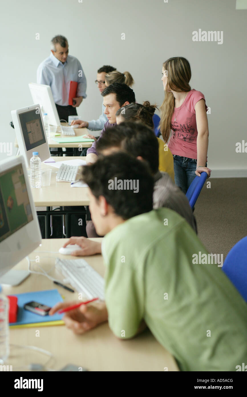 Young professionals using computers Stock Photo - Alamy