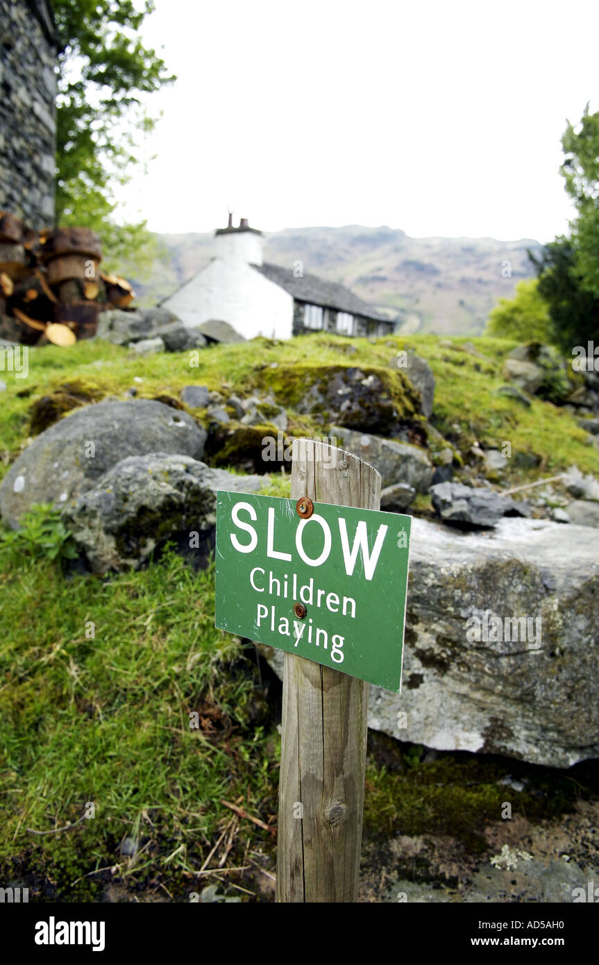 Warning signpost on a mountain path Stock Photo - Alamy