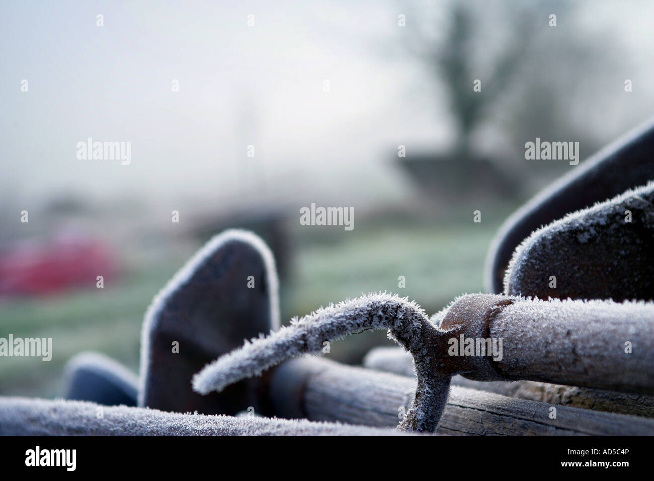 Frozen agricultural tools Stock Photo - Alamy
