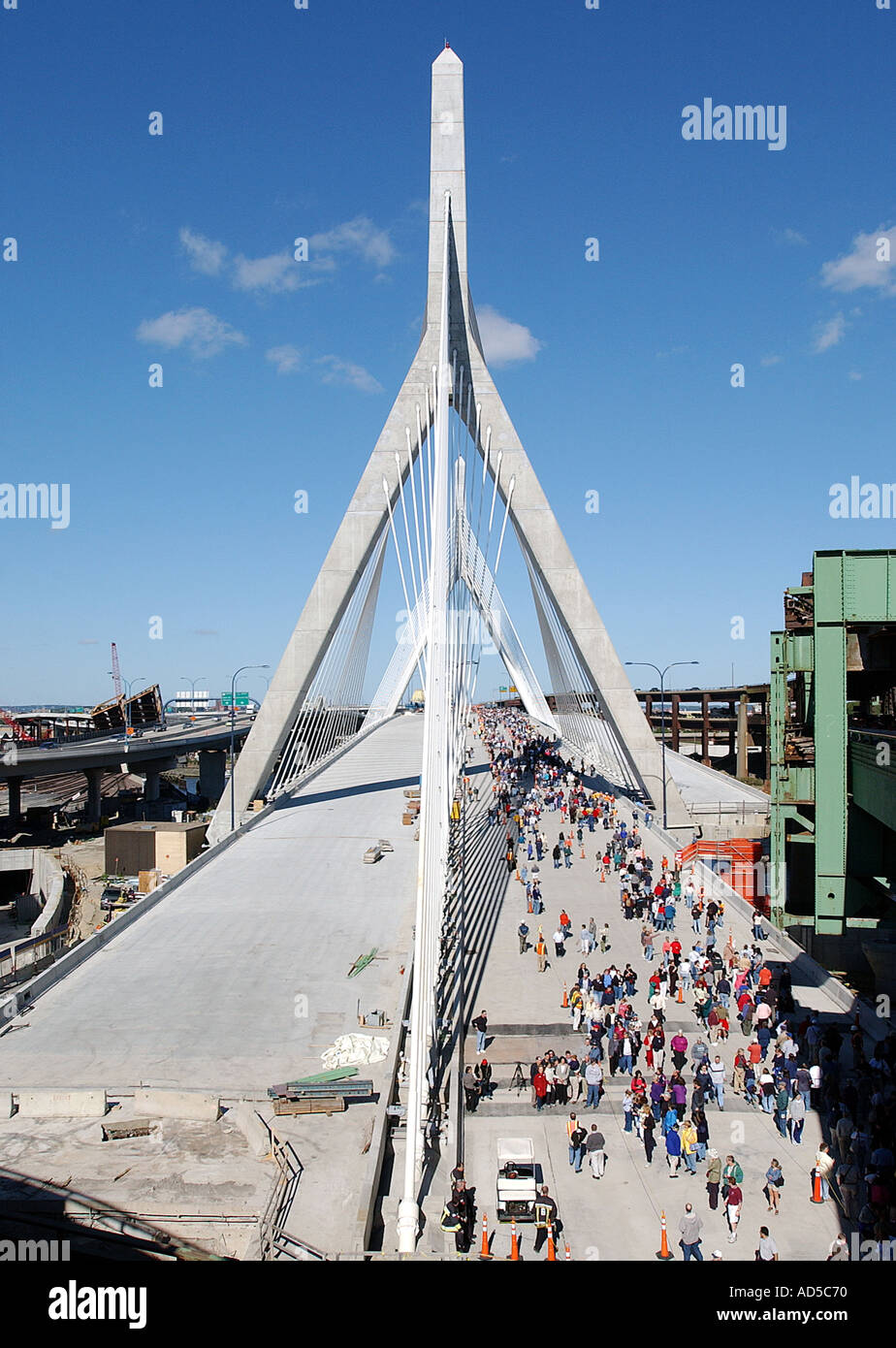 Visitors walk on the newly completed Zakim Bridge before opening to ...