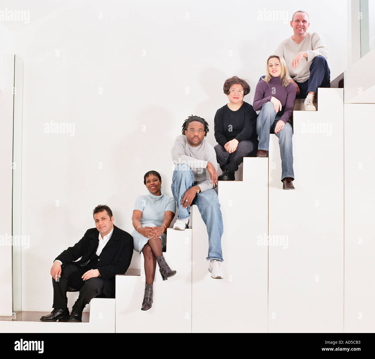 People sat on stairs hi-res stock photography and images - Alamy