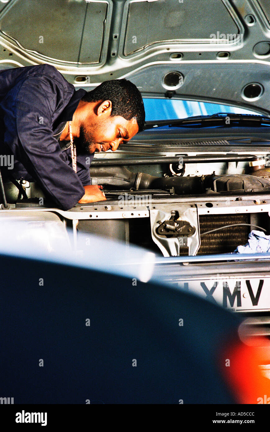 student mechanic working on engine Stock Photo - Alamy
