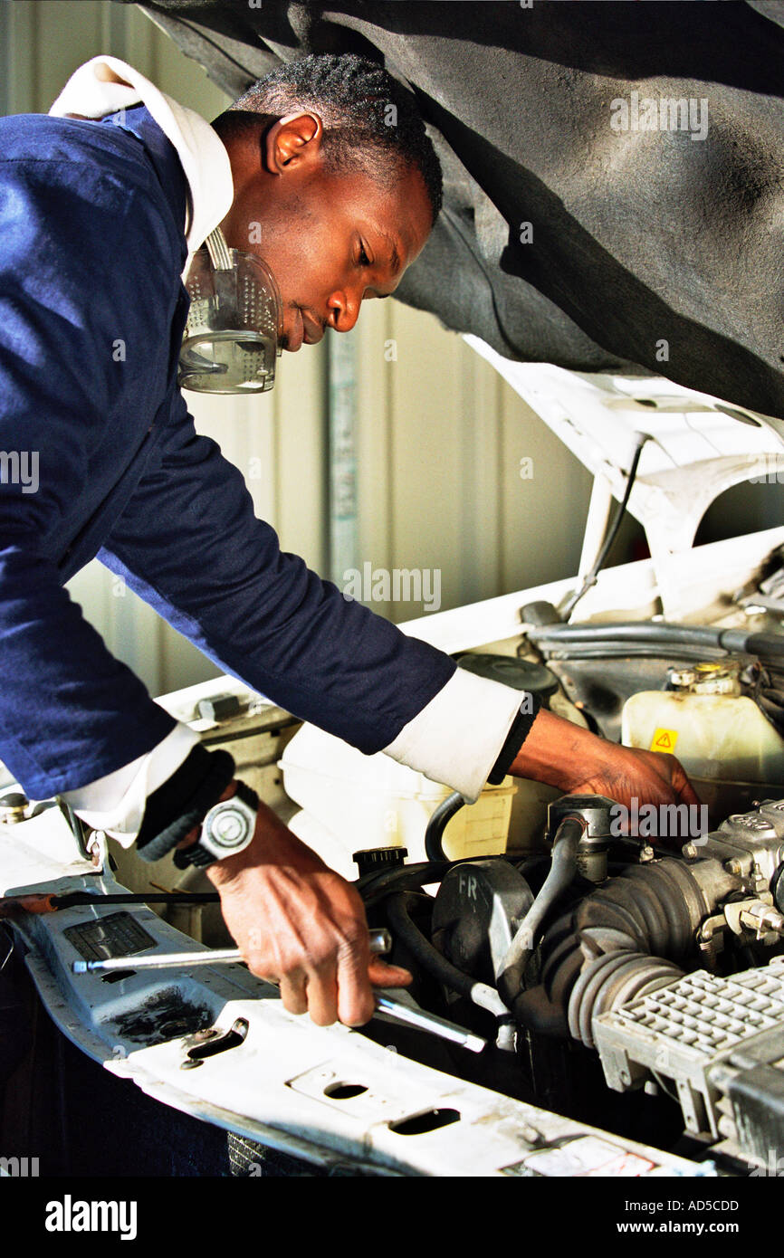 student mechanic working on engine Stock Photo - Alamy