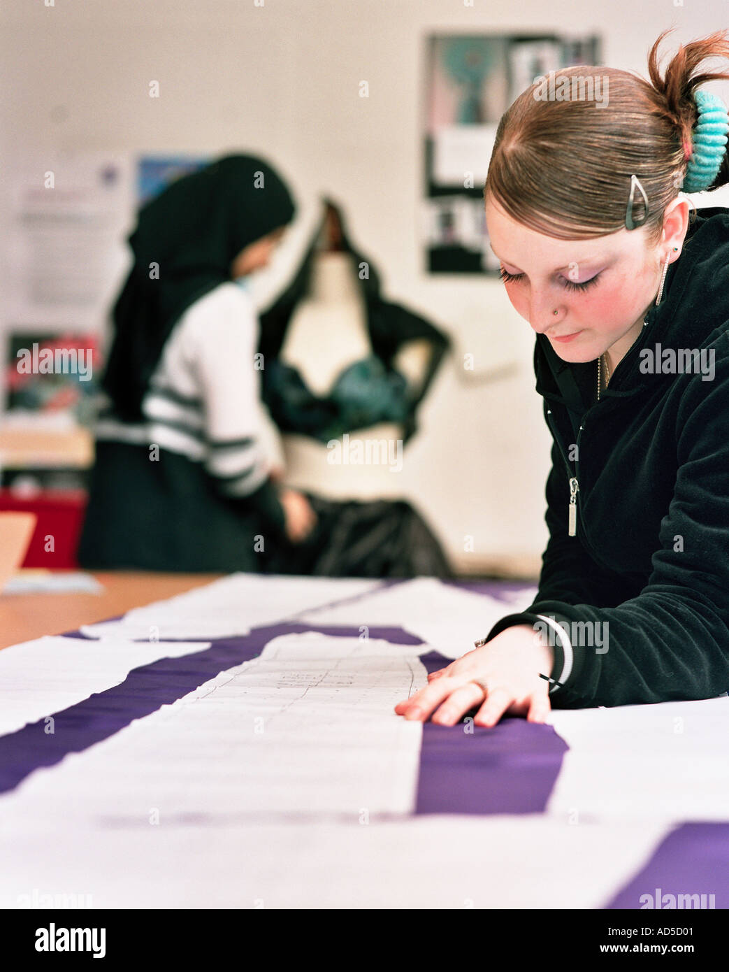 College design students working on piece Stock Photo - Alamy