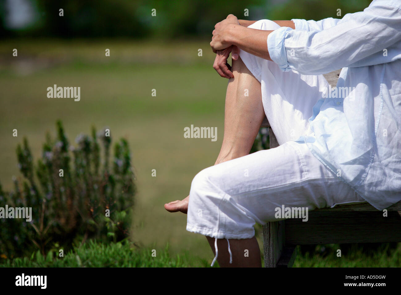 Man relaxing in the sun Stock Photo - Alamy