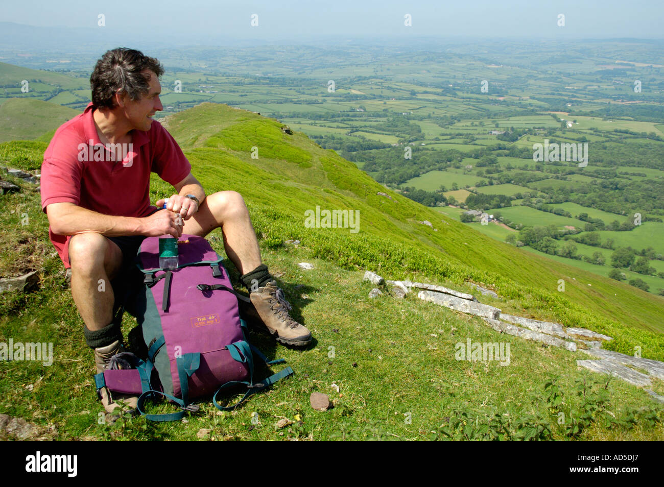 Guided walking group heading up the Dragons Back in Black Mountains ...