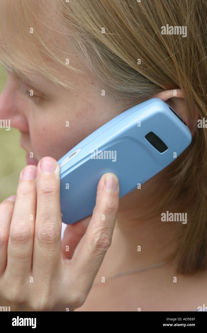 woman chatting on mobile phone Stock Photo - Alamy