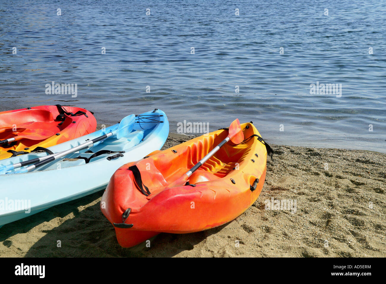 Canoes on the beach Stock Photo - Alamy