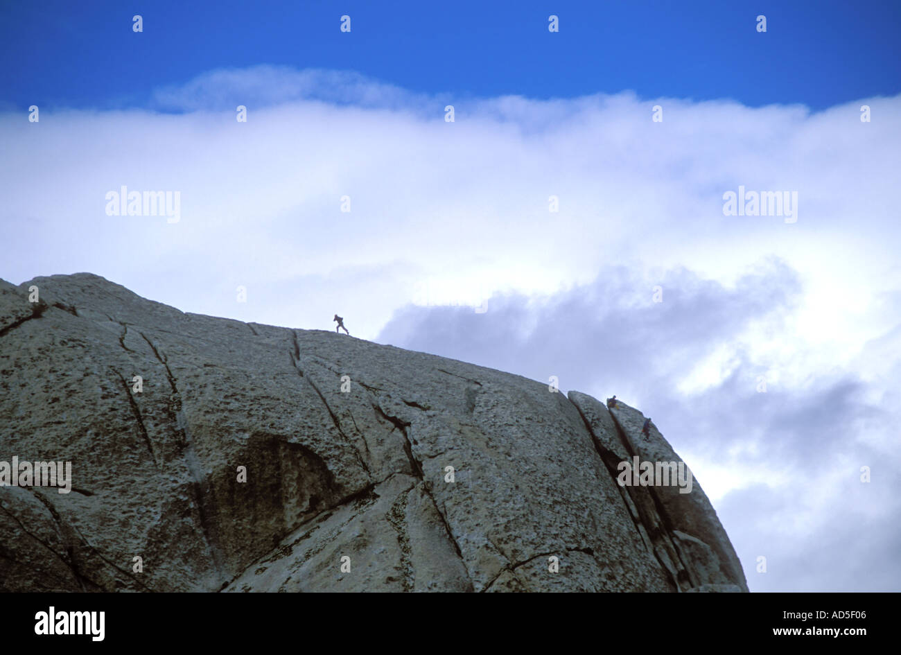 Climber running across cliff City of Rocks Idaho Stock Photo - Alamy