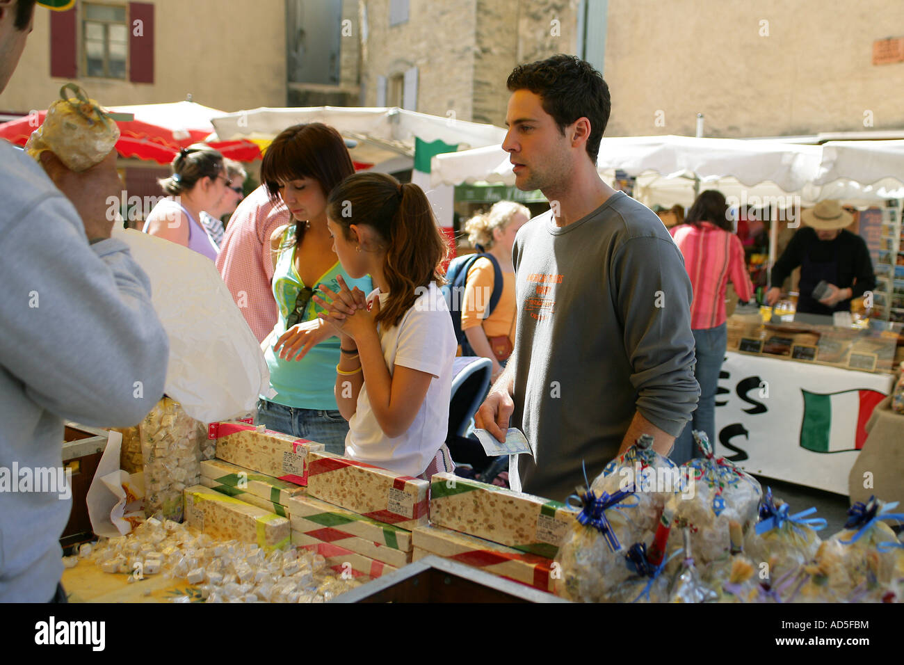 Family at the marketplace Stock Photo - Alamy