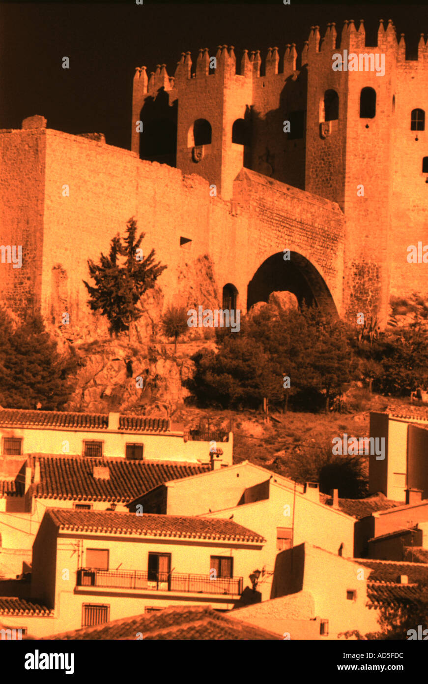 Landscape of a Spanish town and castle, shot in infrared at high noon ...