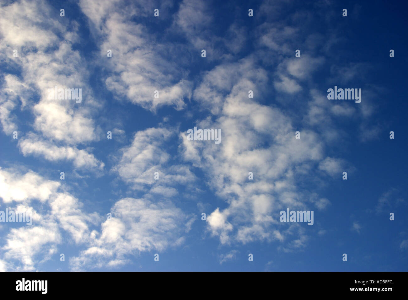 Scattered white wispy clouds hi-res stock photography and images - Alamy