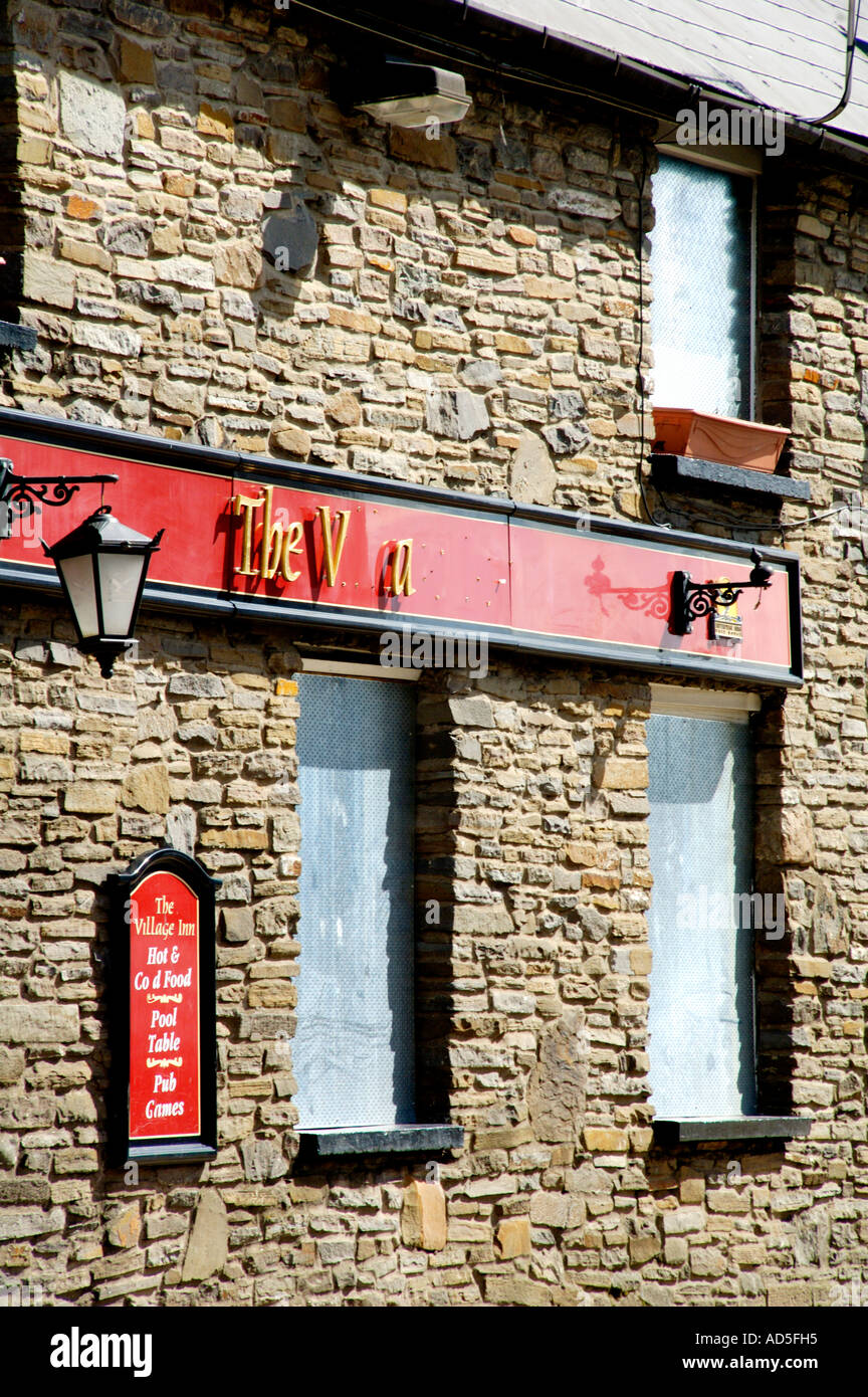Boarded up Village Inn pub at Nelson near Caerphilly South Wales UK GB ...