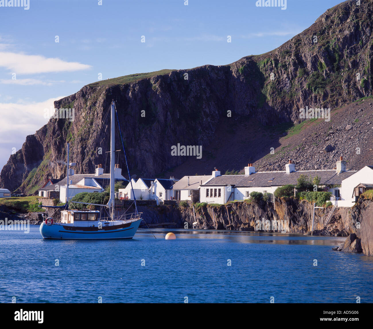 Yacht tied up in flooded slate quarry at Ellenabeich, also called ...