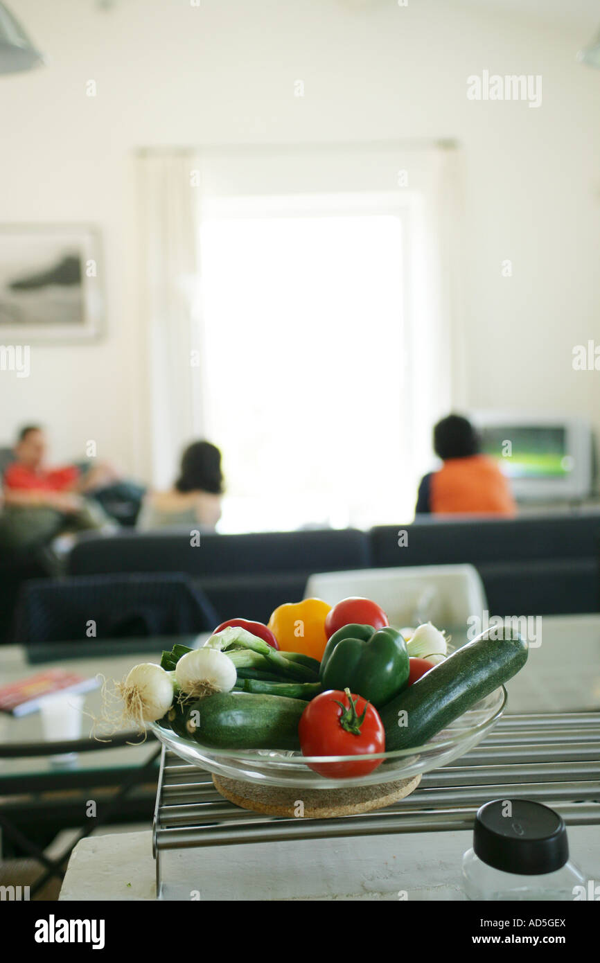 Vegetable plate set on a dining table Stock Photo - Alamy