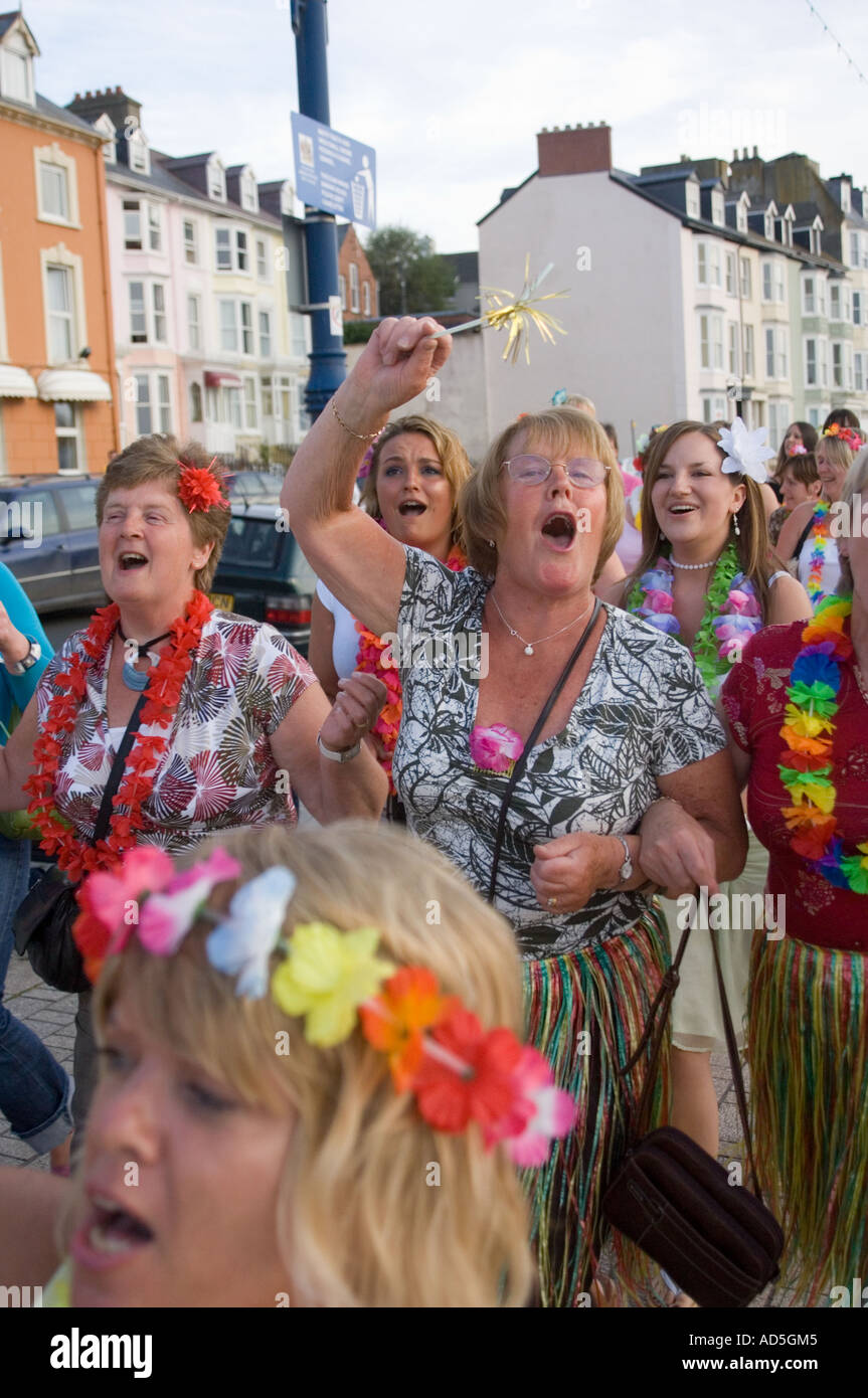 Women Dressed In Hula Skirts On Hawaiian Style Hen Night Aberystwyth