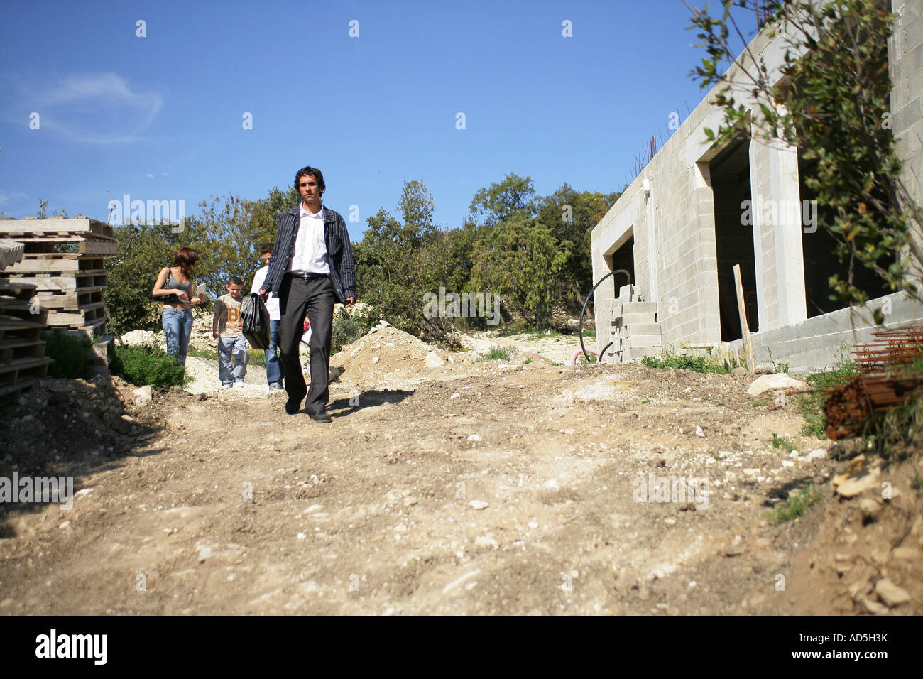 People visiting a building site Stock Photo - Alamy