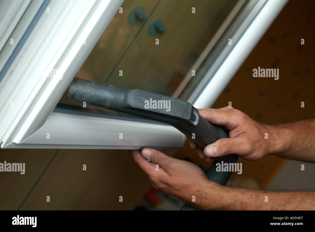 joiner cleaning window Stock Photo - Alamy