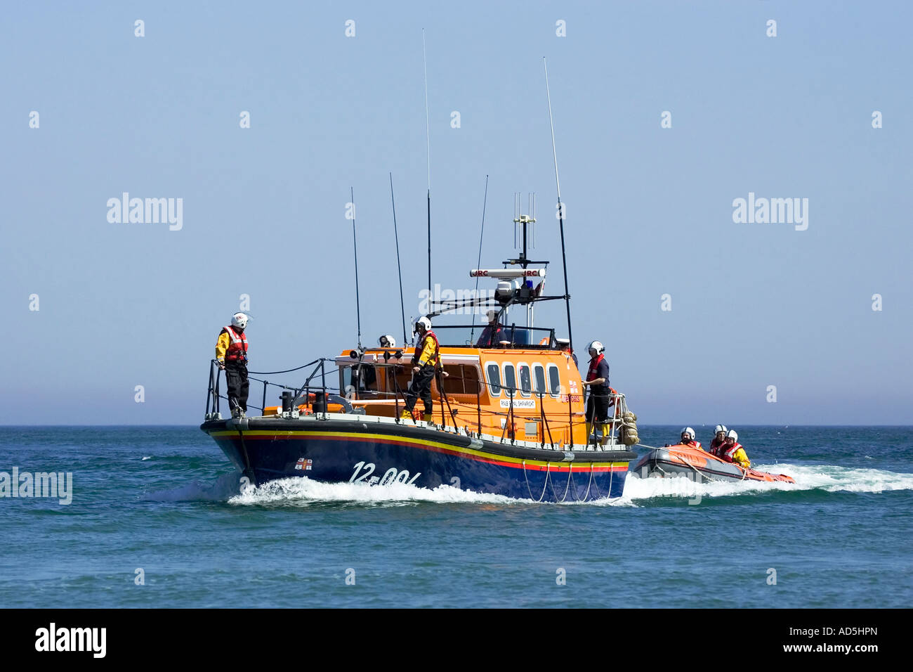 RNLI Cromer ALB Lifeboat towing in the ILB Stock Photo - Alamy
