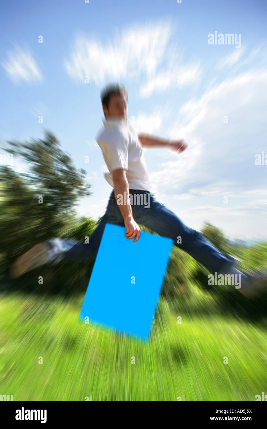 Man showing a blue display board Stock Photo - Alamy