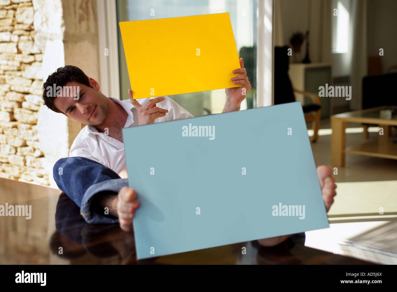 Man showing display panels Stock Photo - Alamy