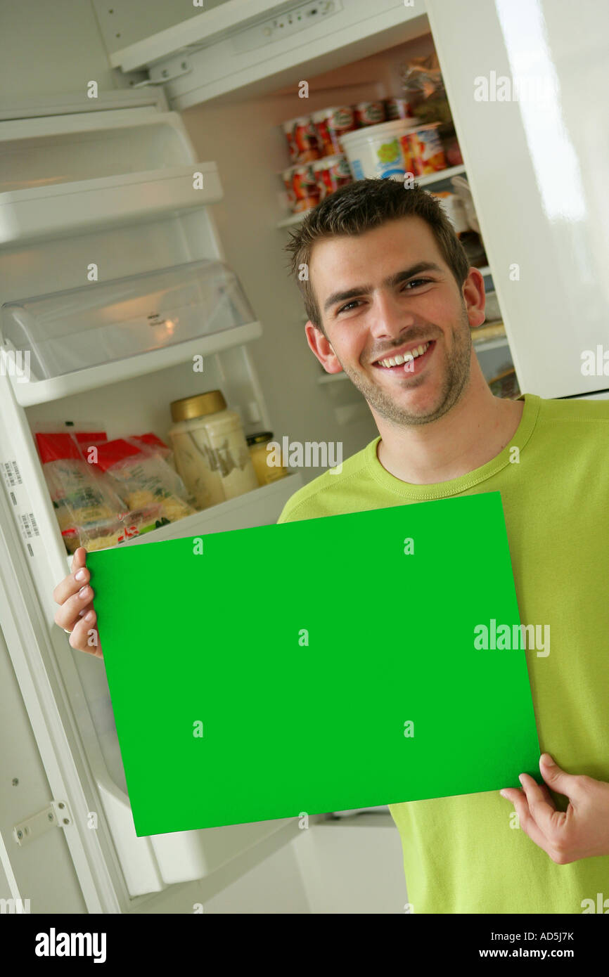 Man showing a green display board Stock Photo - Alamy